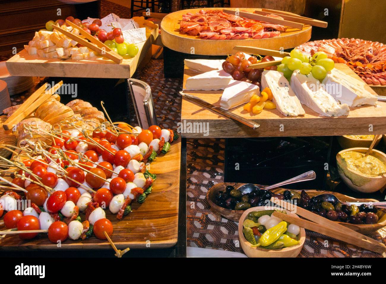 A cheese buffet is set up at an event Stock Photo - Alamy