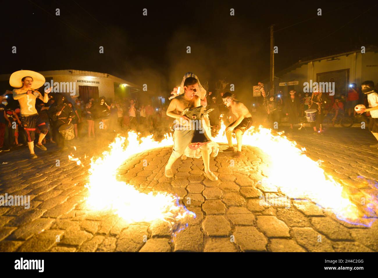 Tonacatepeque, El Salvador. 01st Nov, 2021. Revelers gesture while ...