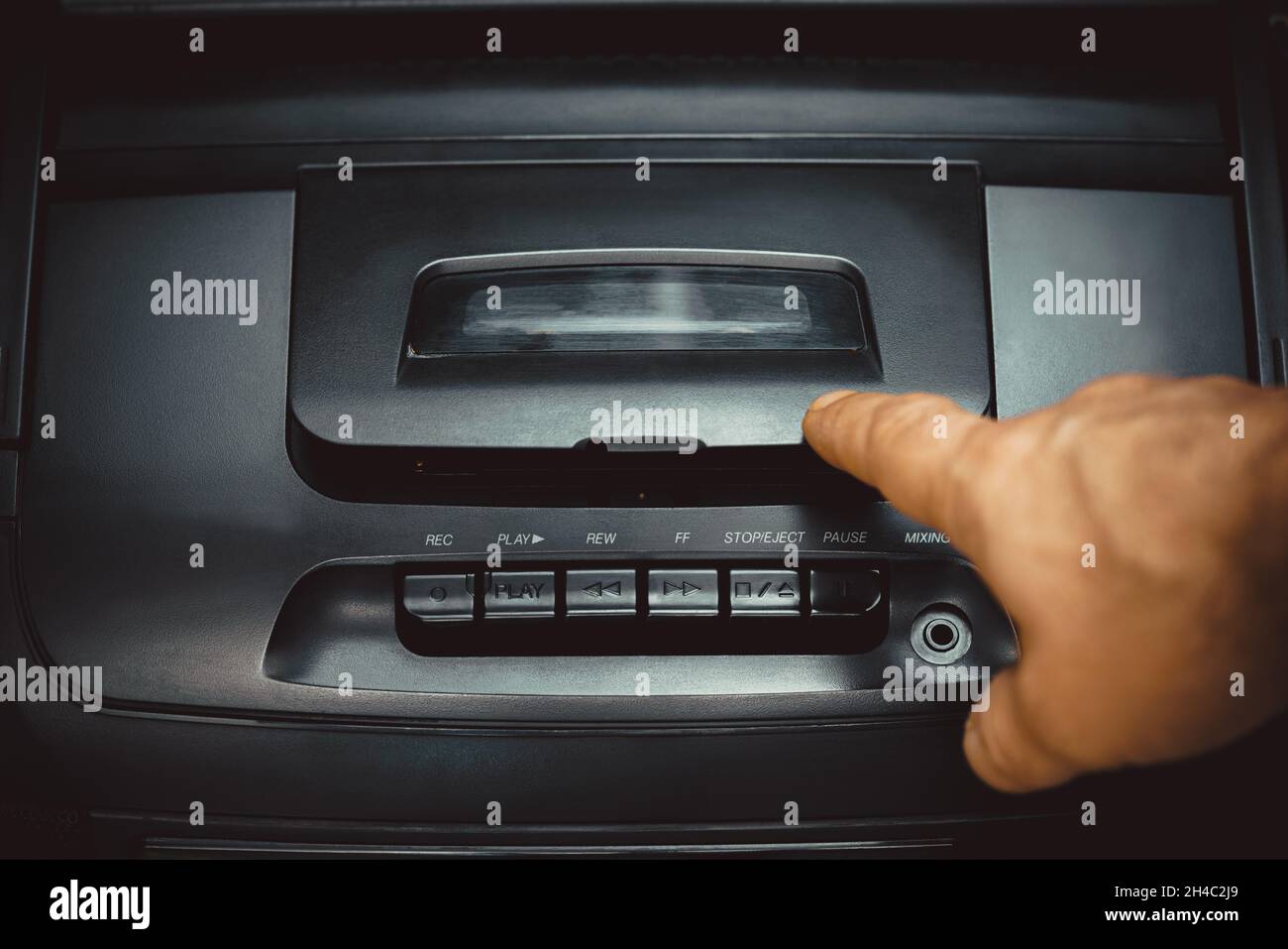 Hand holding audio cassette tape hi-res stock photography and images ...