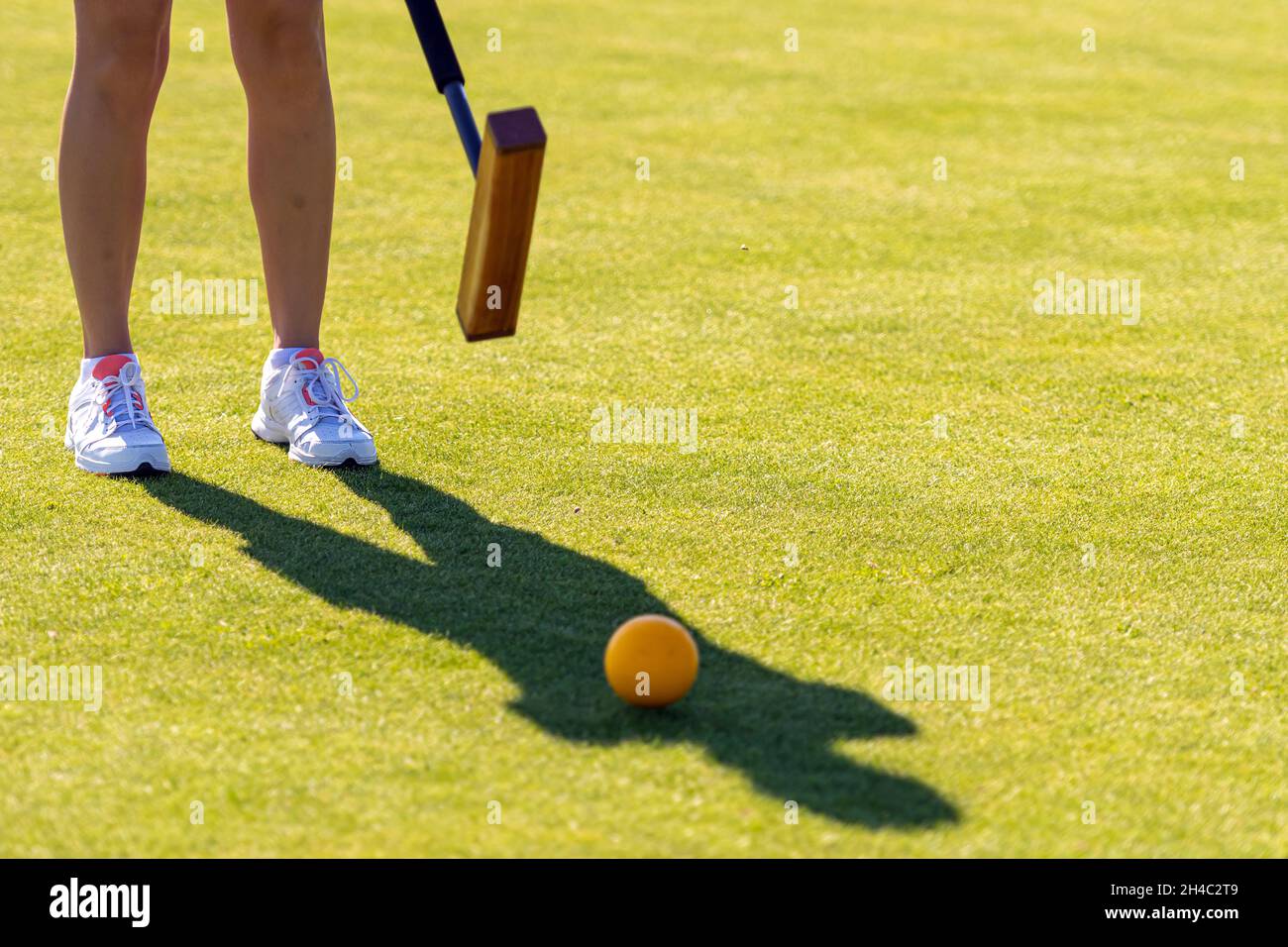 Female croquet player hi-res stock photography and images - Alamy