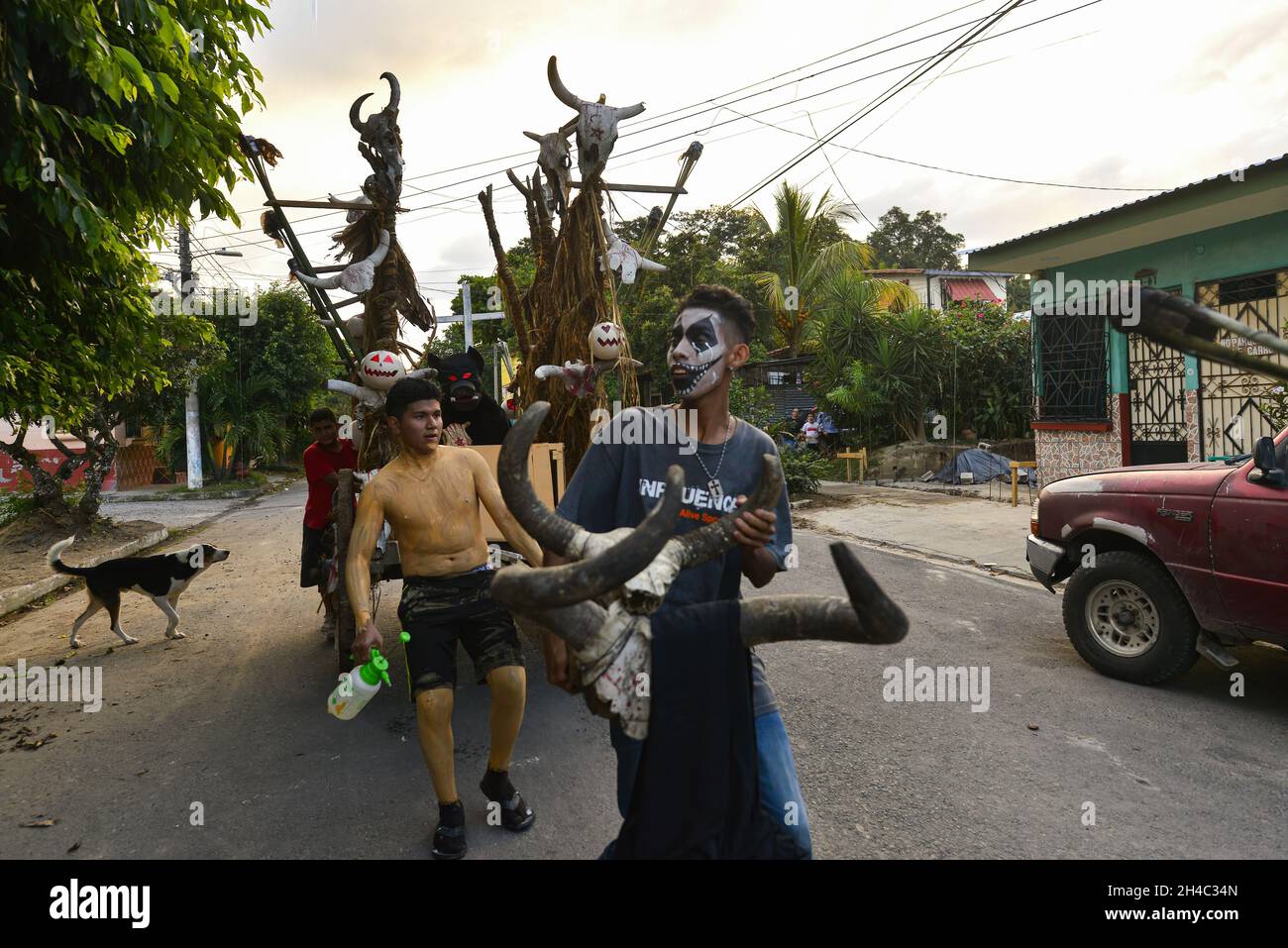 A reveler gestures while taking part of a parade.Salvadorans celebrated ...
