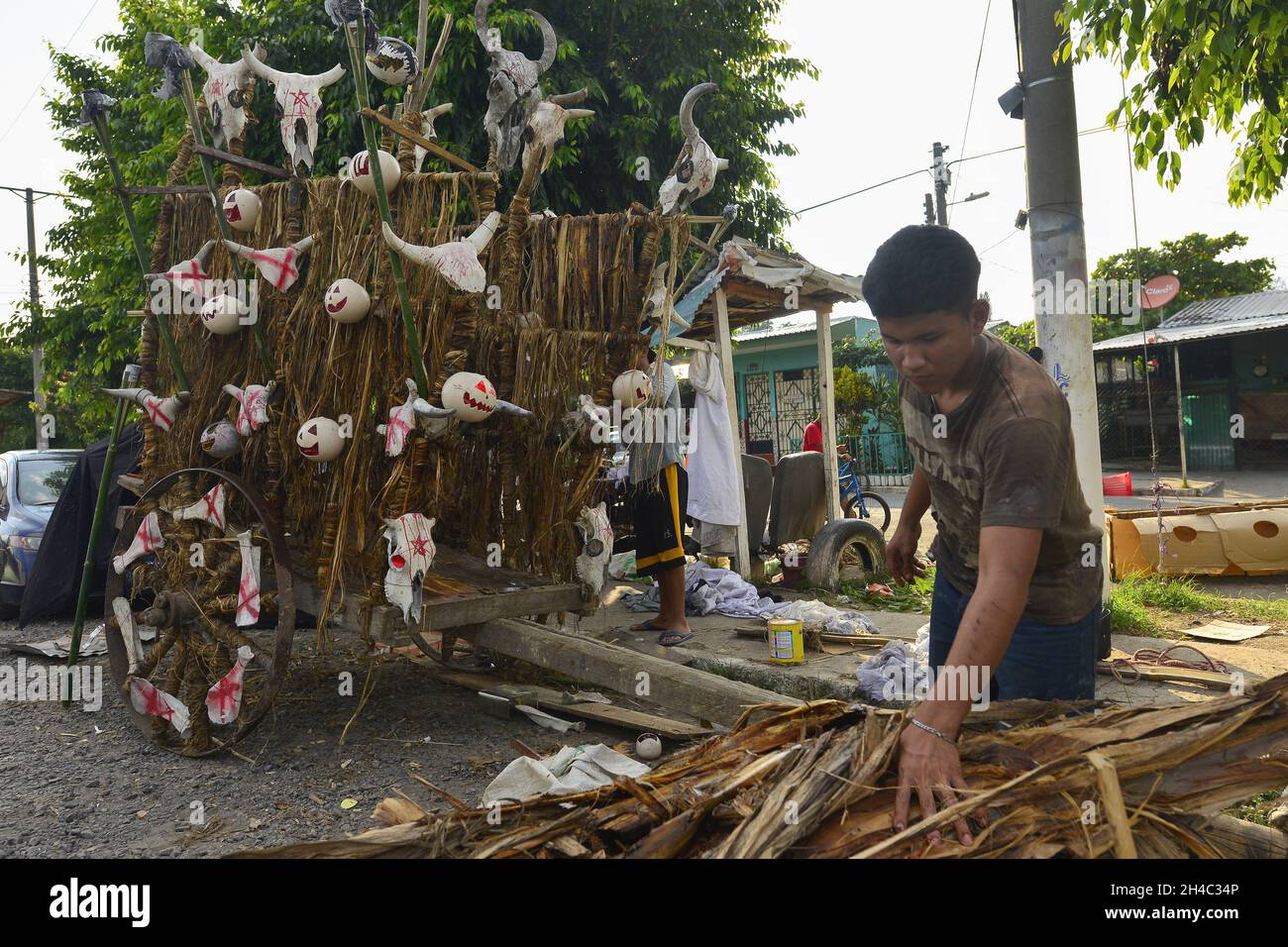 A reveler prepares a cart before the parade.Salvadorans celebrated ...