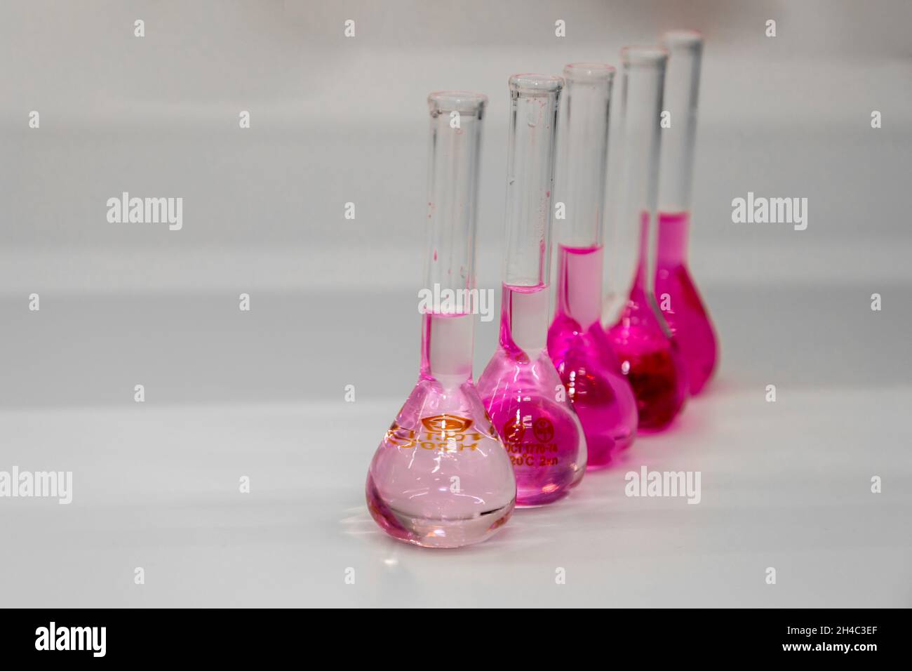 Composition of laboratory material with colored liquids in realistic ...