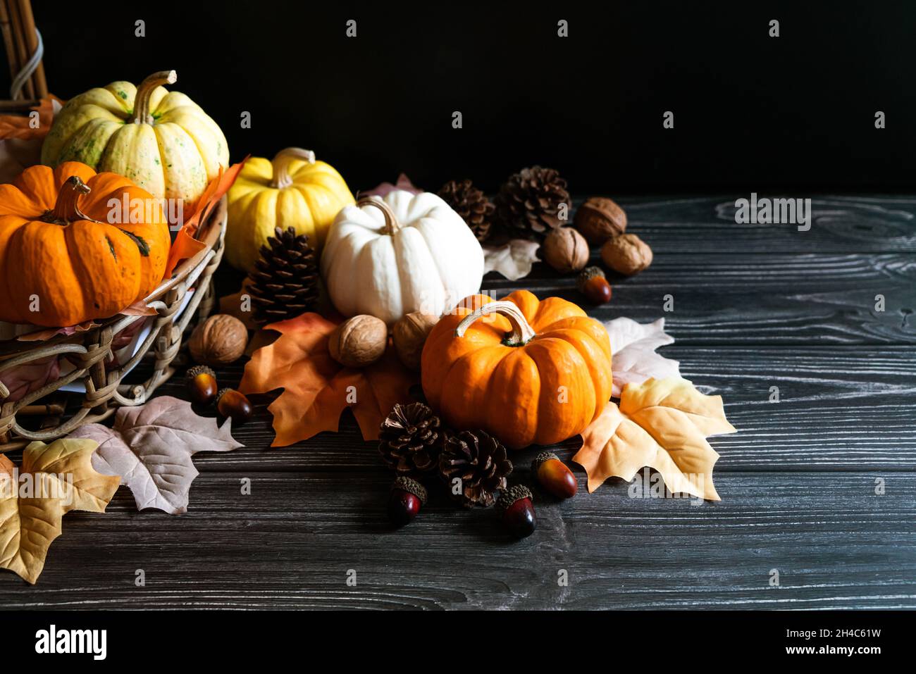 Happy Thanksgiving Day with pumpkin and nut on wooden table Stock Photo ...