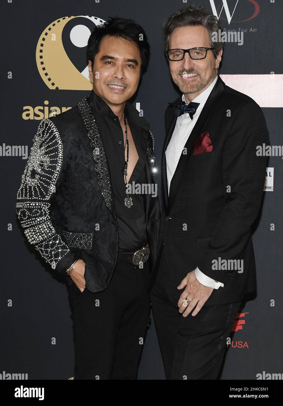 (L-R) Sir Daniel Winn and Randall J. Slavin arrives at the 2021 Asian ...