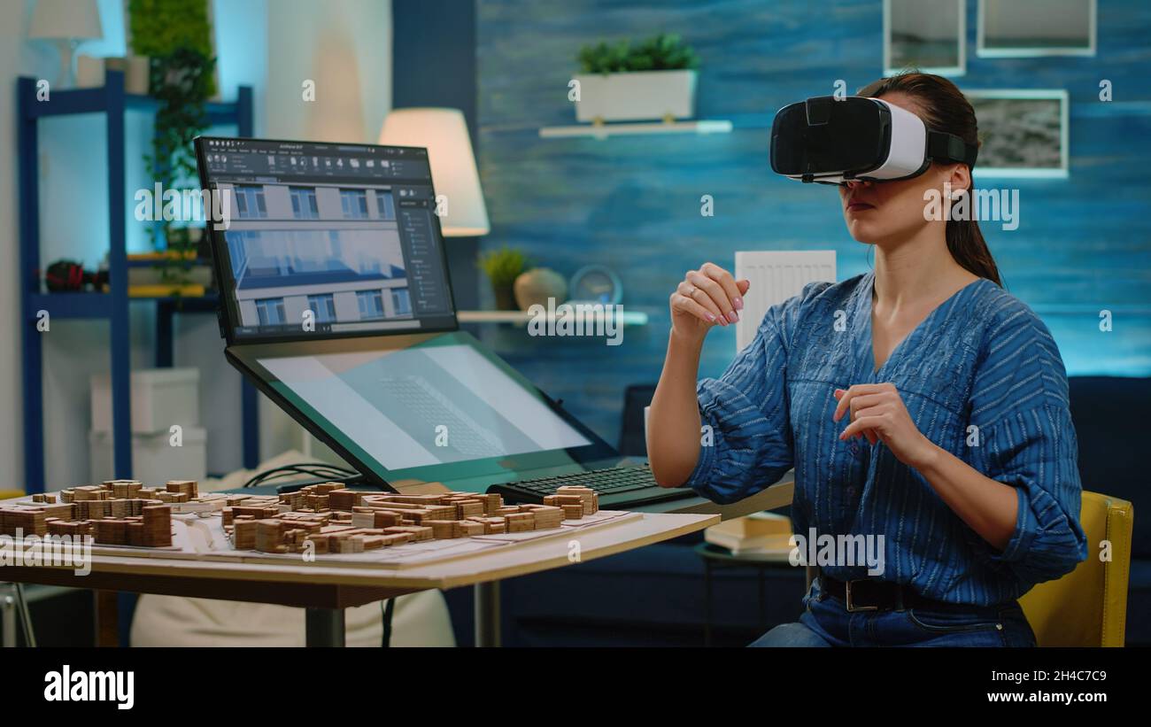 Woman architect using vr glasses for construction development. Engineer ...