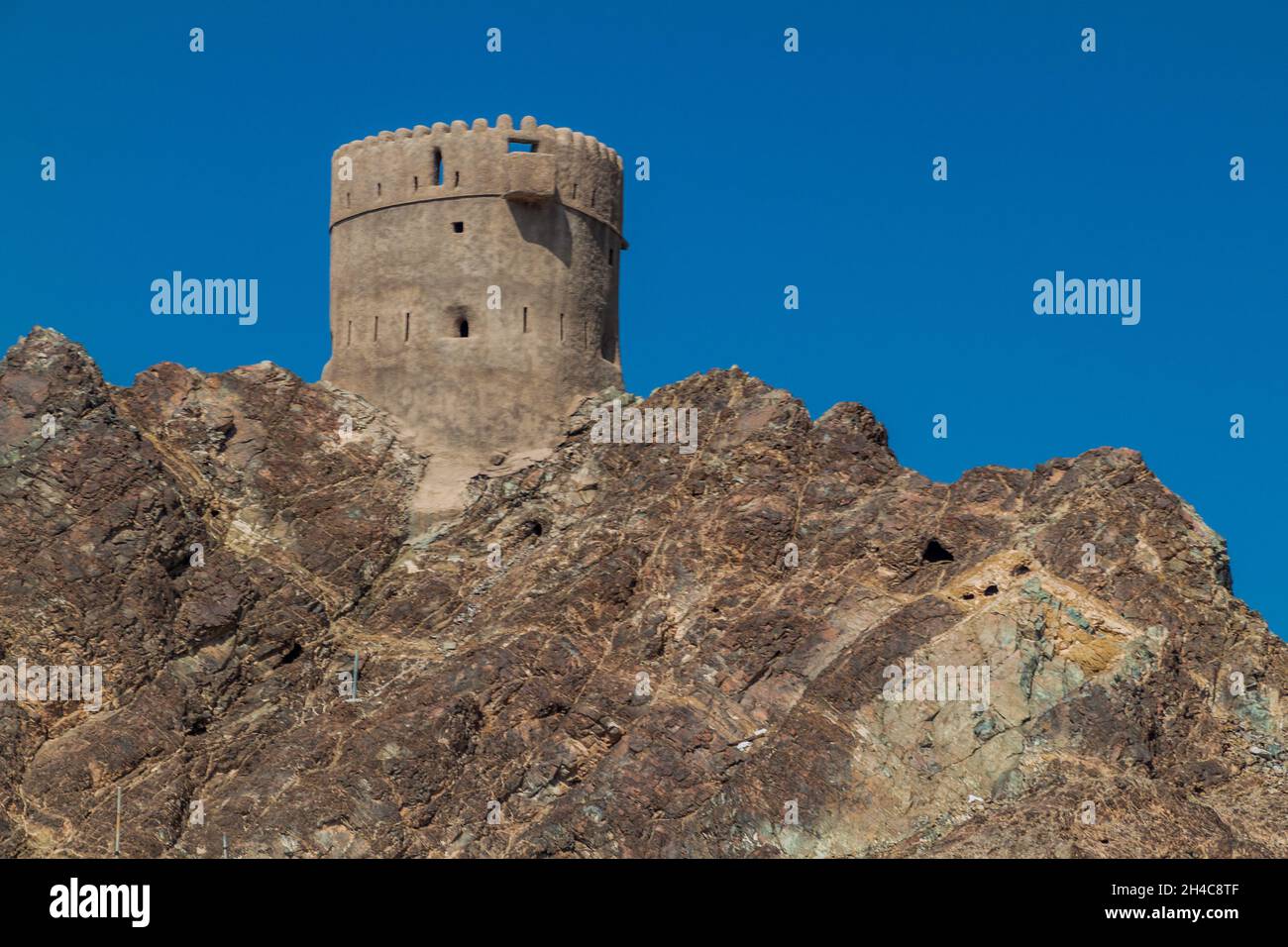 Watchtower in Muttrah neighborhood in Muscat, Oman Stock Photo - Alamy
