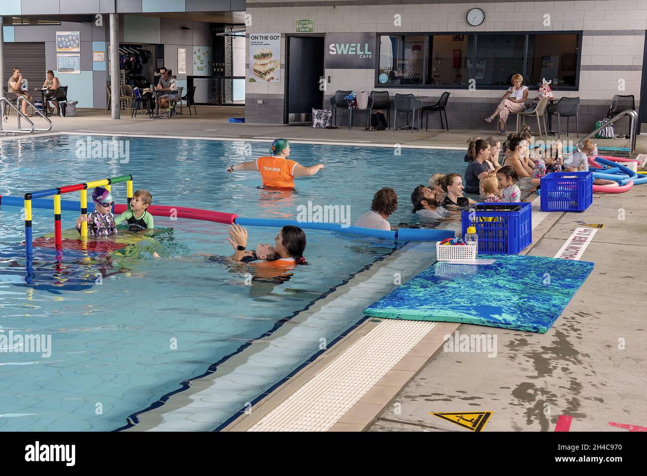 MACKAY, AUSTRALIA - Oct 07, 2021: A closeup of people swimming and ...