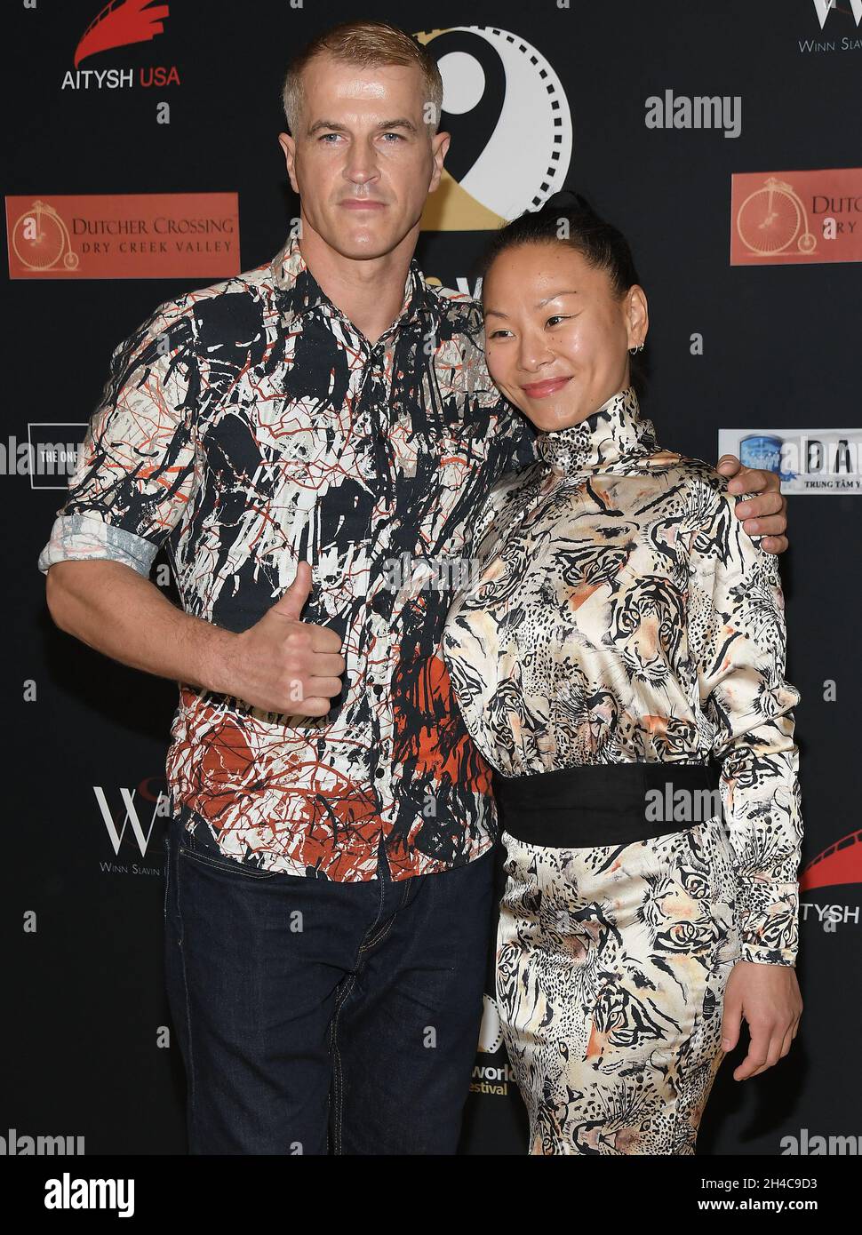 (L-R) David Torok and Jade Xu arrives at the 2021 Asian World Film ...