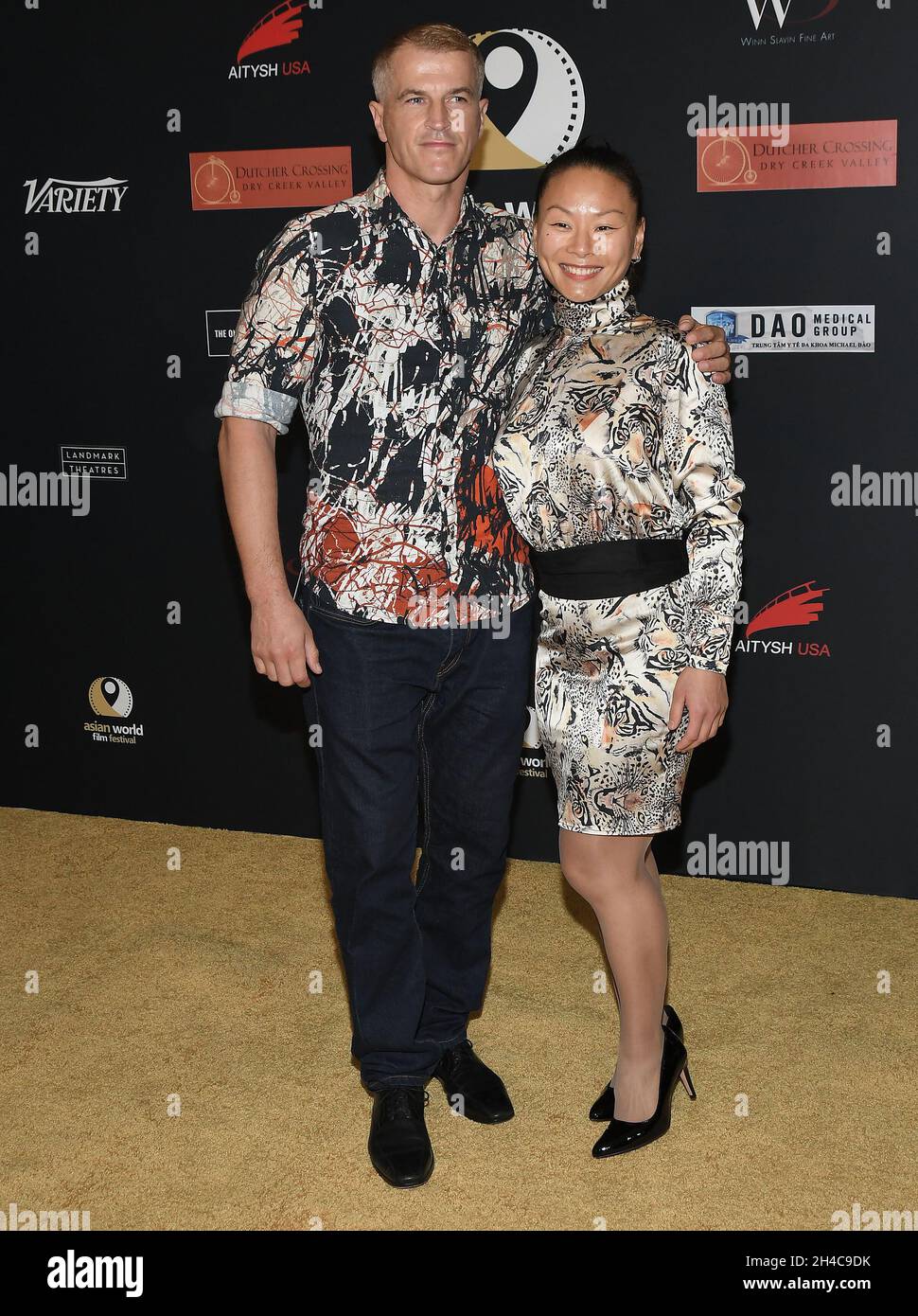 L R David Torok And Jade Xu Arrives At The 2021 Asian World Film Festival Opening Night Gala
