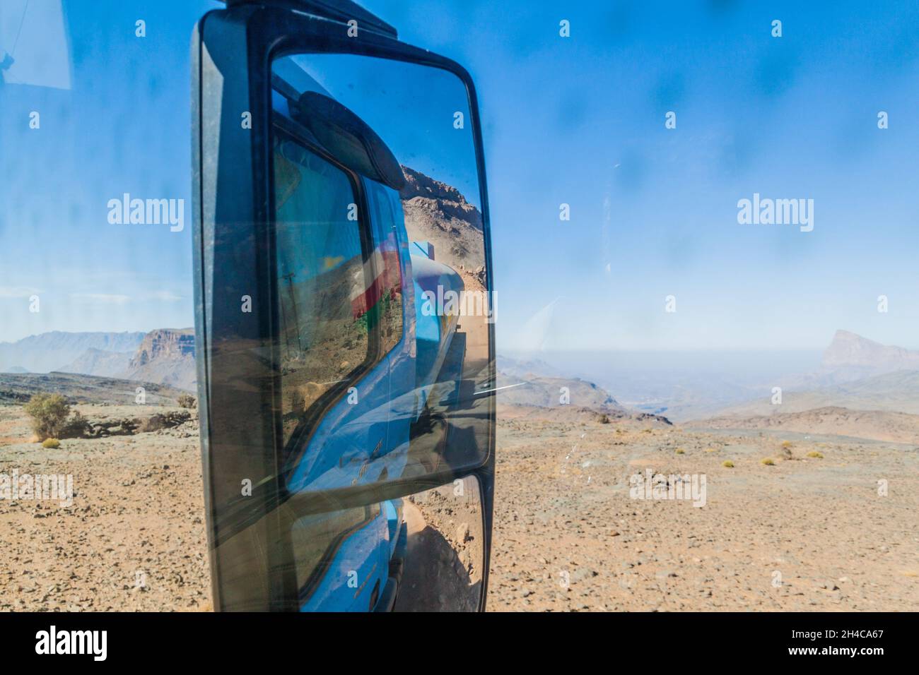 Wing mirror of a water tank truck in Hajar Mountains, Oman Stock Photo ...