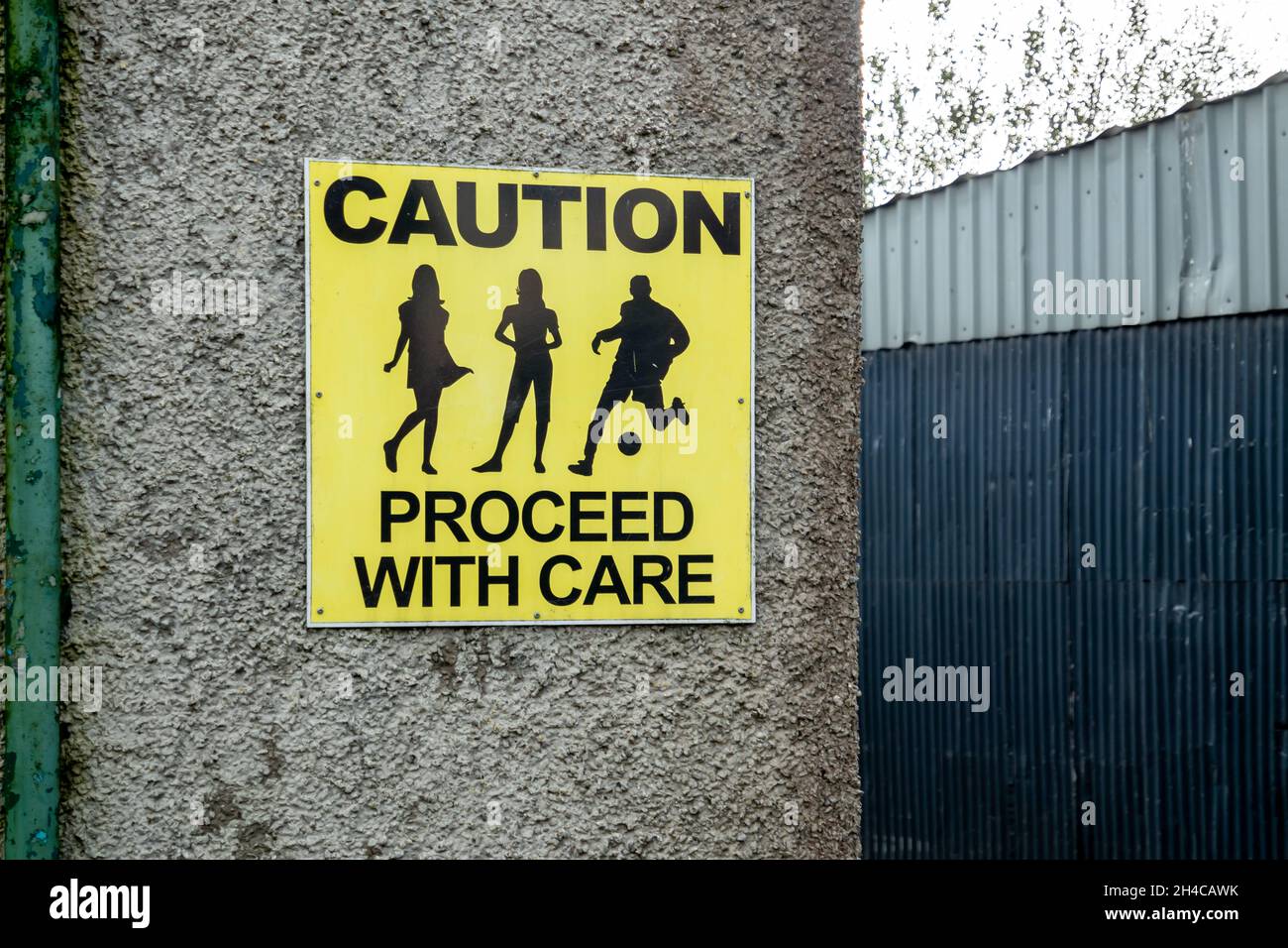 Sign warning Caution Proceed with care Stock Photo - Alamy