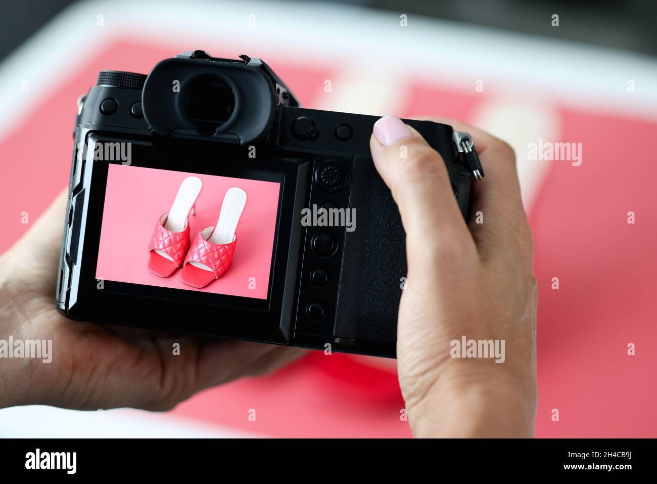 Womens summer shoes on the camera screen Stock Photo - Alamy