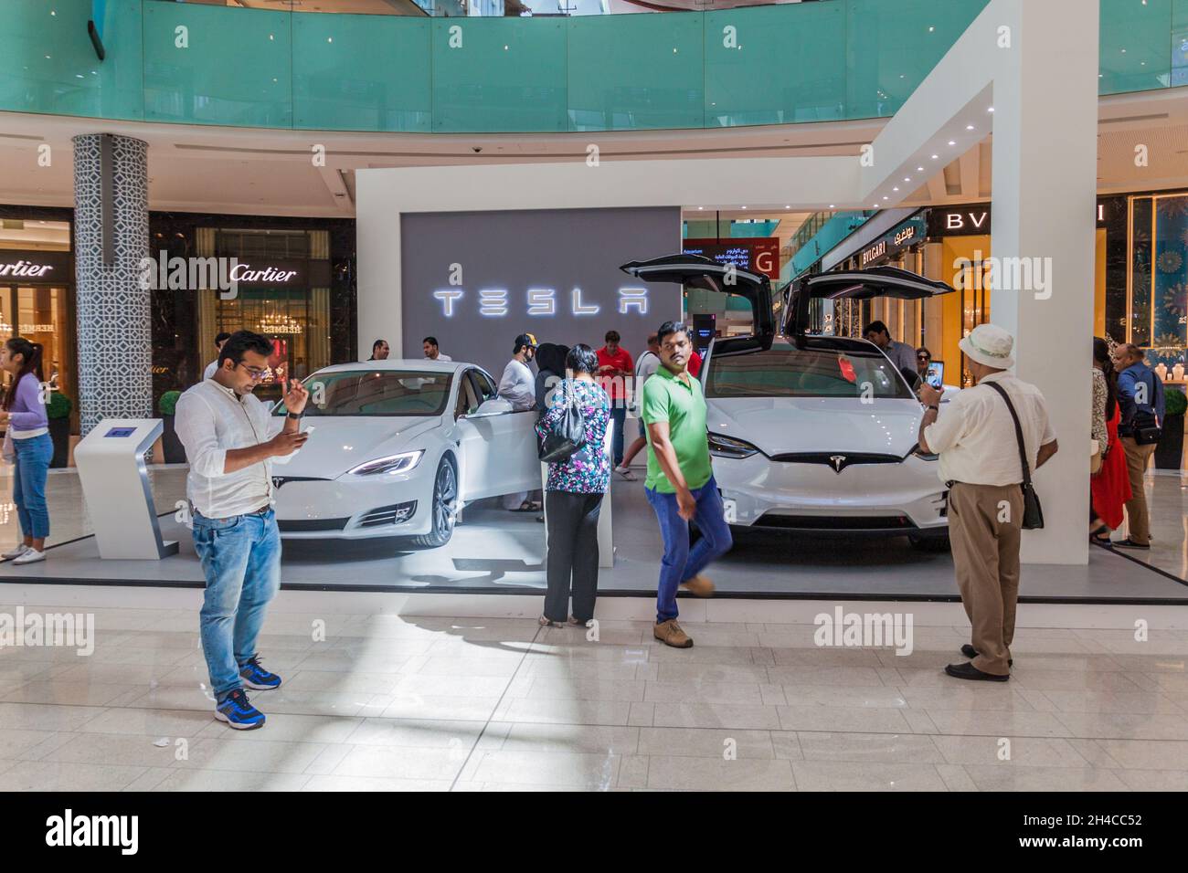 DUBAI, UAE - MARCH 12, 2017: Two Tesla cars exhibited in the Dubai Mall ...