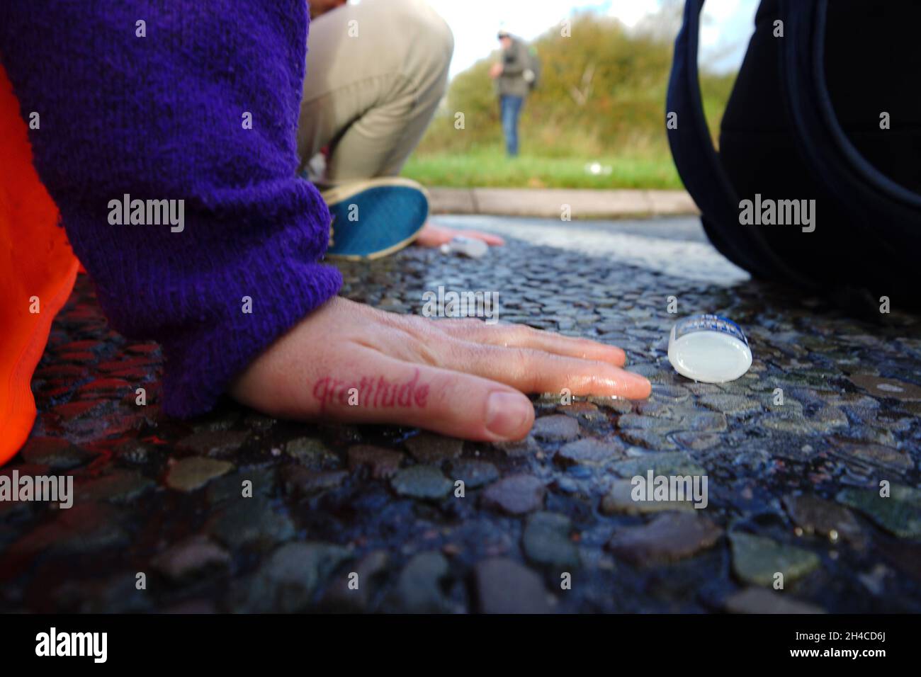 Insulate britain glued hi-res stock photography and images - Alamy