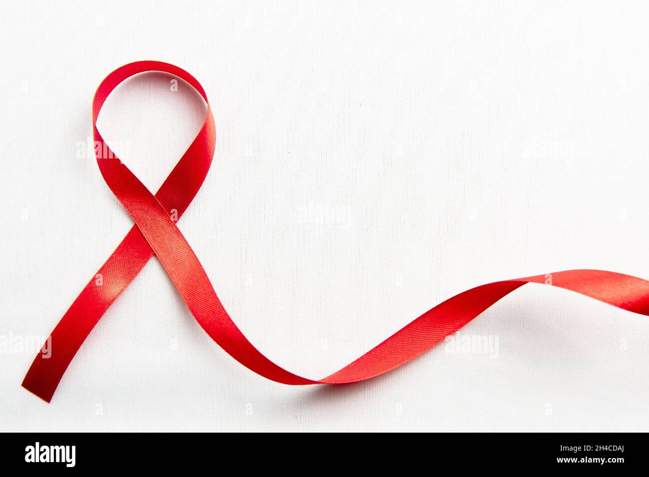 Red ribbon with white background. Hiv Aids ribbon awareness Stock Photo ...