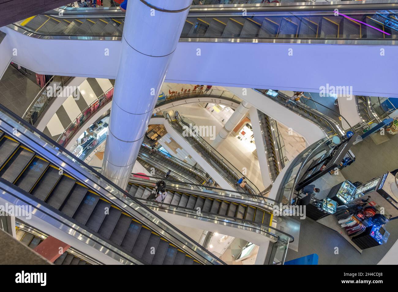 Escalators in a large shopping mall Stock Photo - Alamy