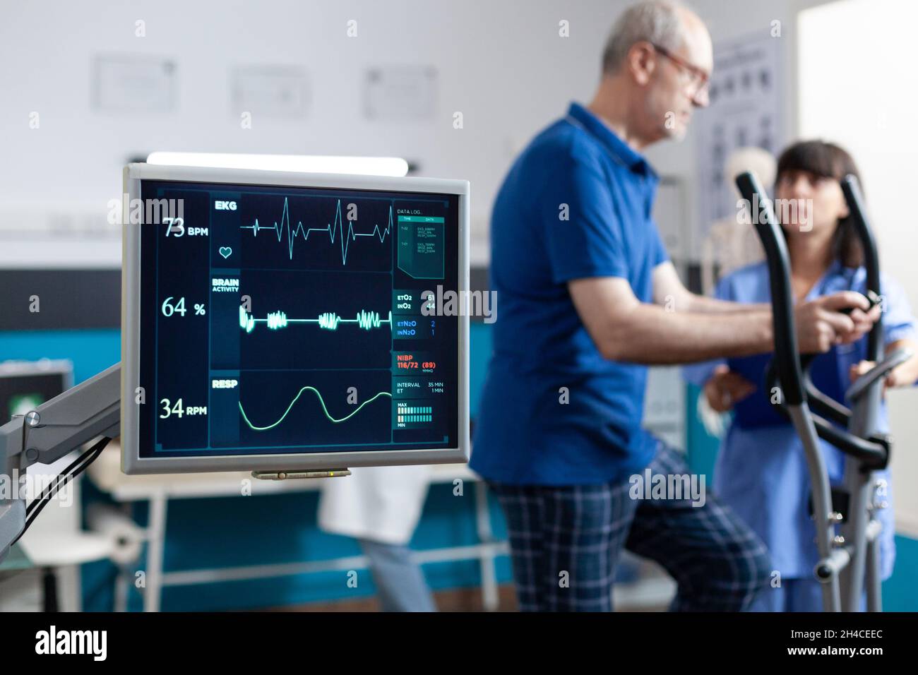 Close up of heart rate monitor measuring heartbeat for patient doing ...
