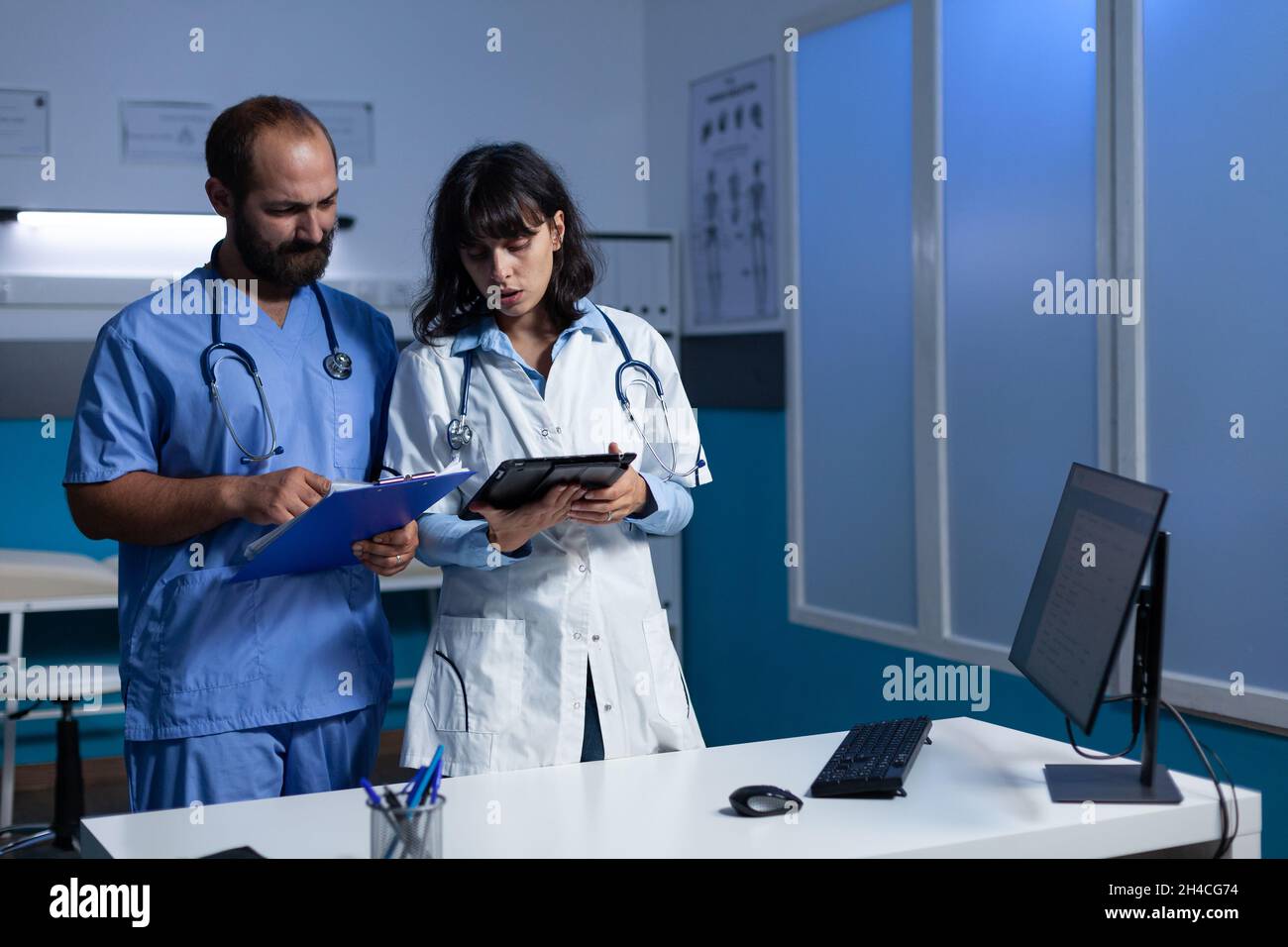 Medical team working late computer hi-res stock photography and images ...