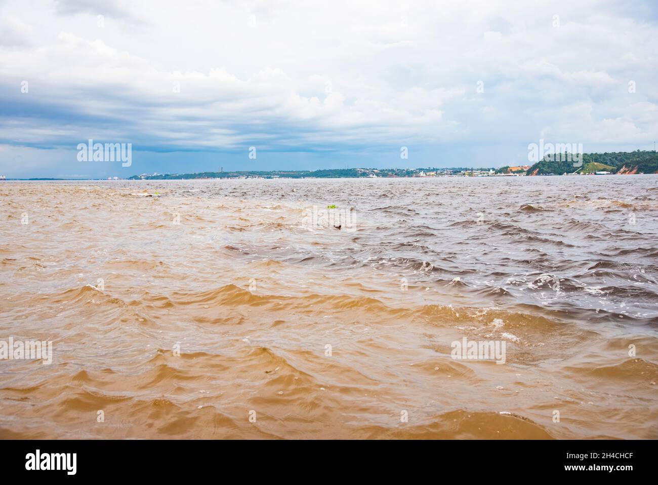 Meeting of Waters of brownish colored Solimoes River and blackish ...