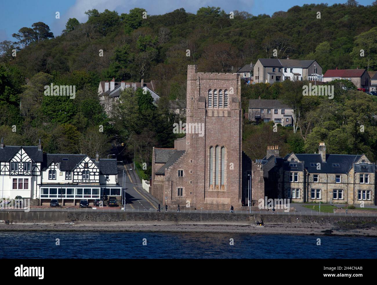 A view along the coast at Oban, Scotland with the Cathedral of St ...