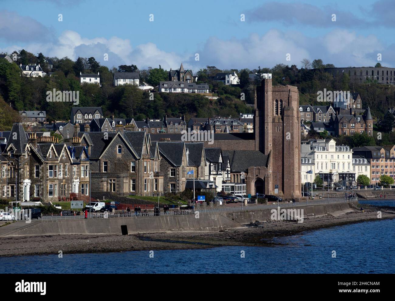 A view along the coast at Oban, Scotland with the Cathedral of St ...