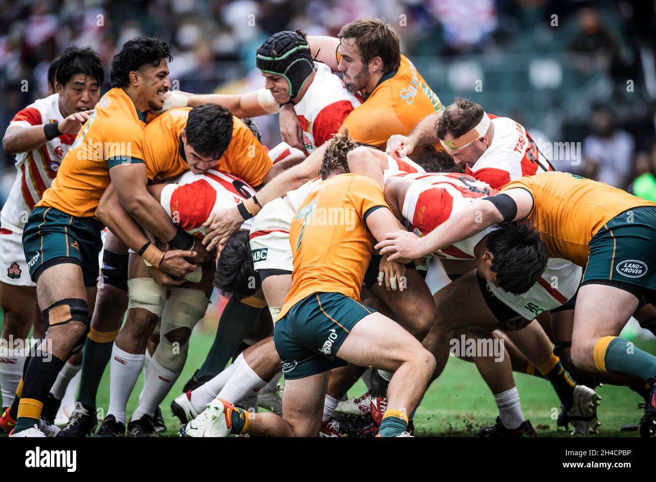 Players of Japan and Australia compete in a maul during the Rugby test ...