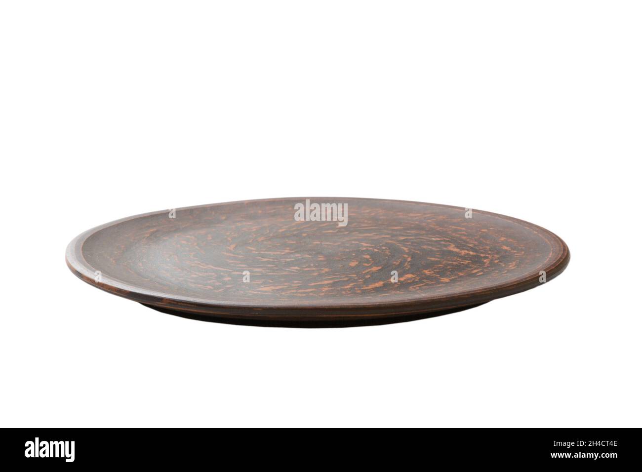 Brown color ceramic round plate isolated over white background ...