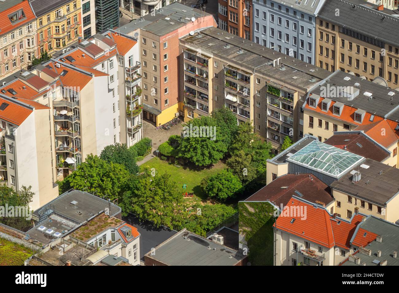 Aerial view above apartment buildings with courtyard, condominiums ...