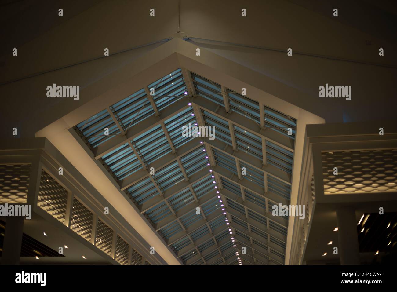 The roof is made of glass. Ceiling with evening light. Natural lighting ...