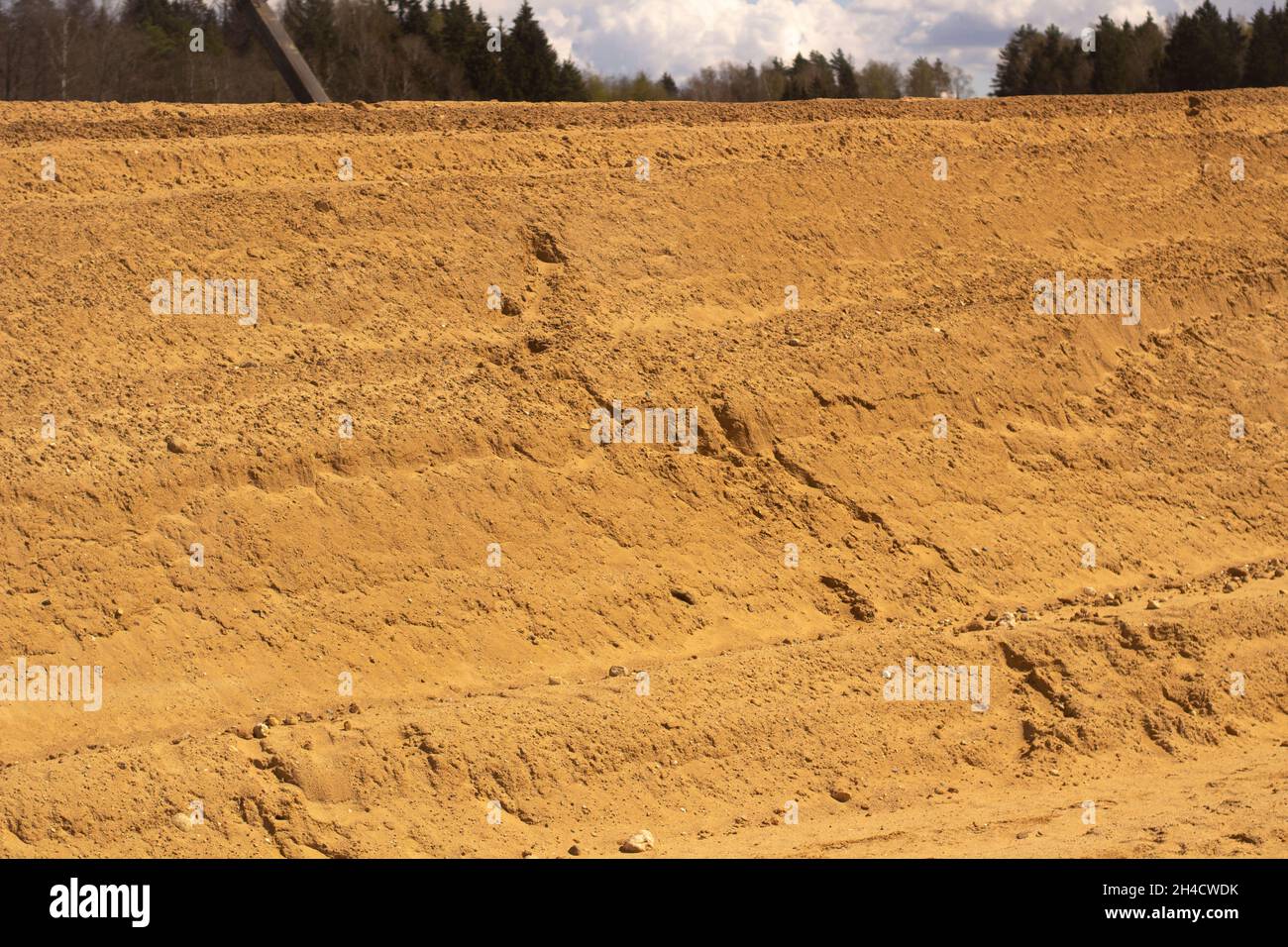 Sand platform. Laying sand in the base. A lot of building material ...