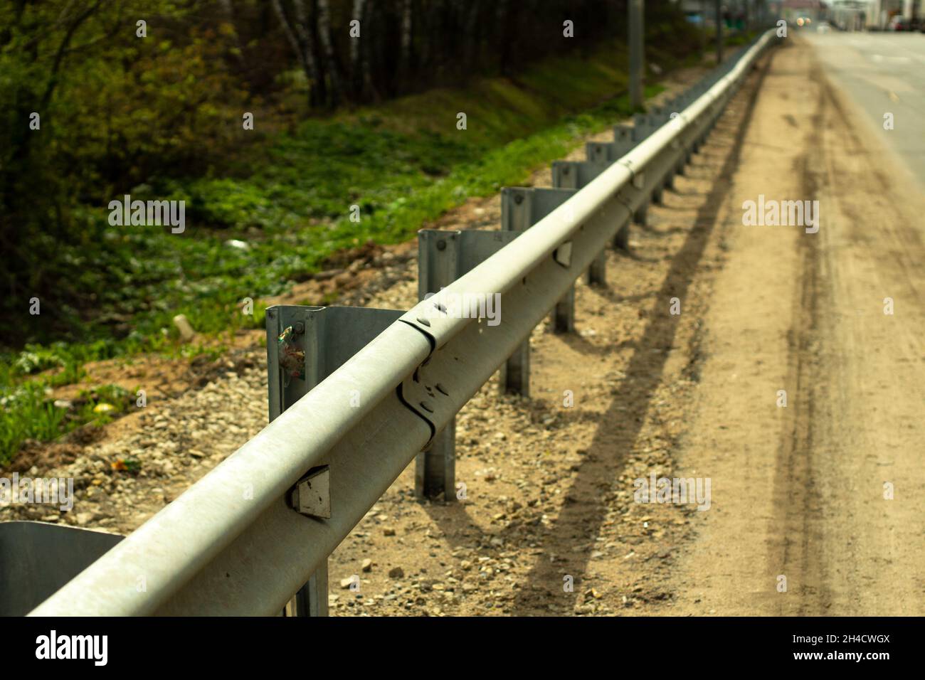 Bumper along the road. Fence for vehicles. Freeway details Stock Photo ...
