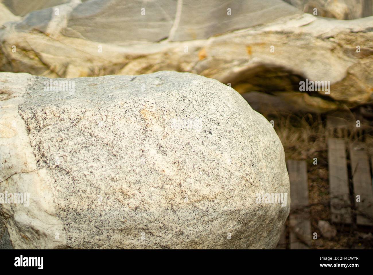 Stone shop. Selection of rocks of different breeds. The stones lie on ...