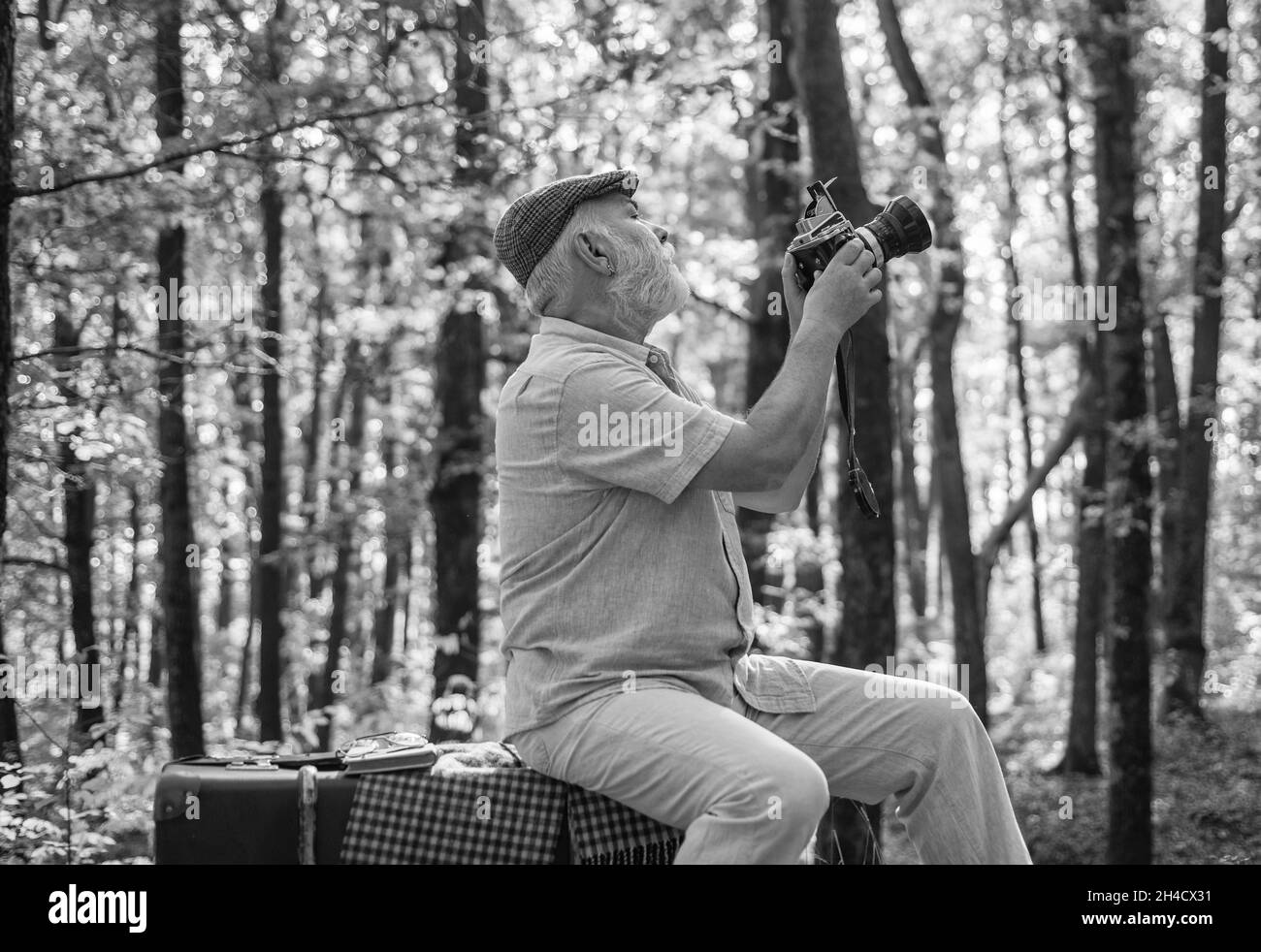 Shooting autumn session. Old man shoot in nature. Landscape and nature ...