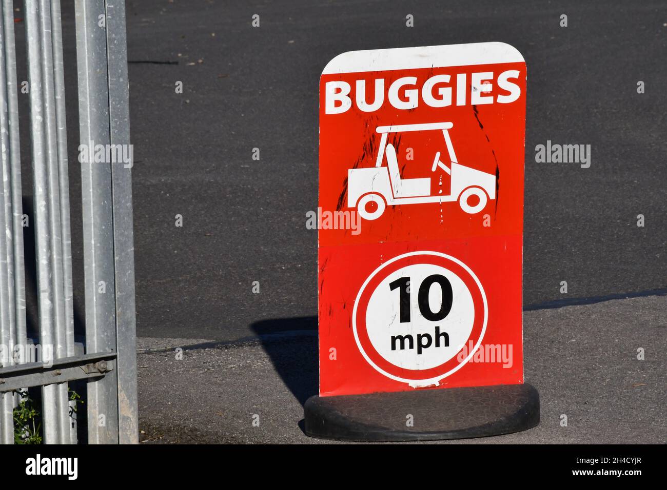 A safety sign stating that Buggies should not go any faster than 10 ...