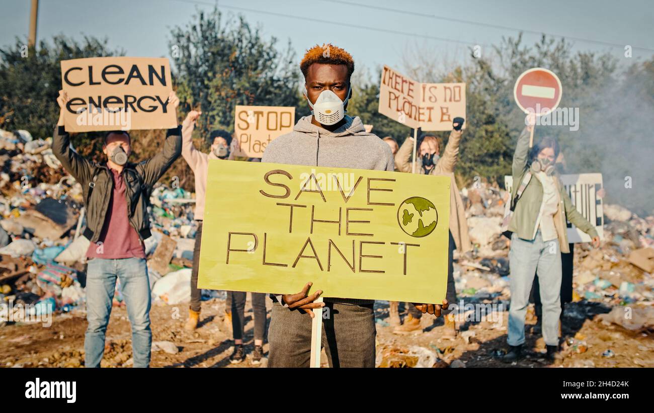 Portrait of a Young Black Man Activist With a Poster Calling to Take ...