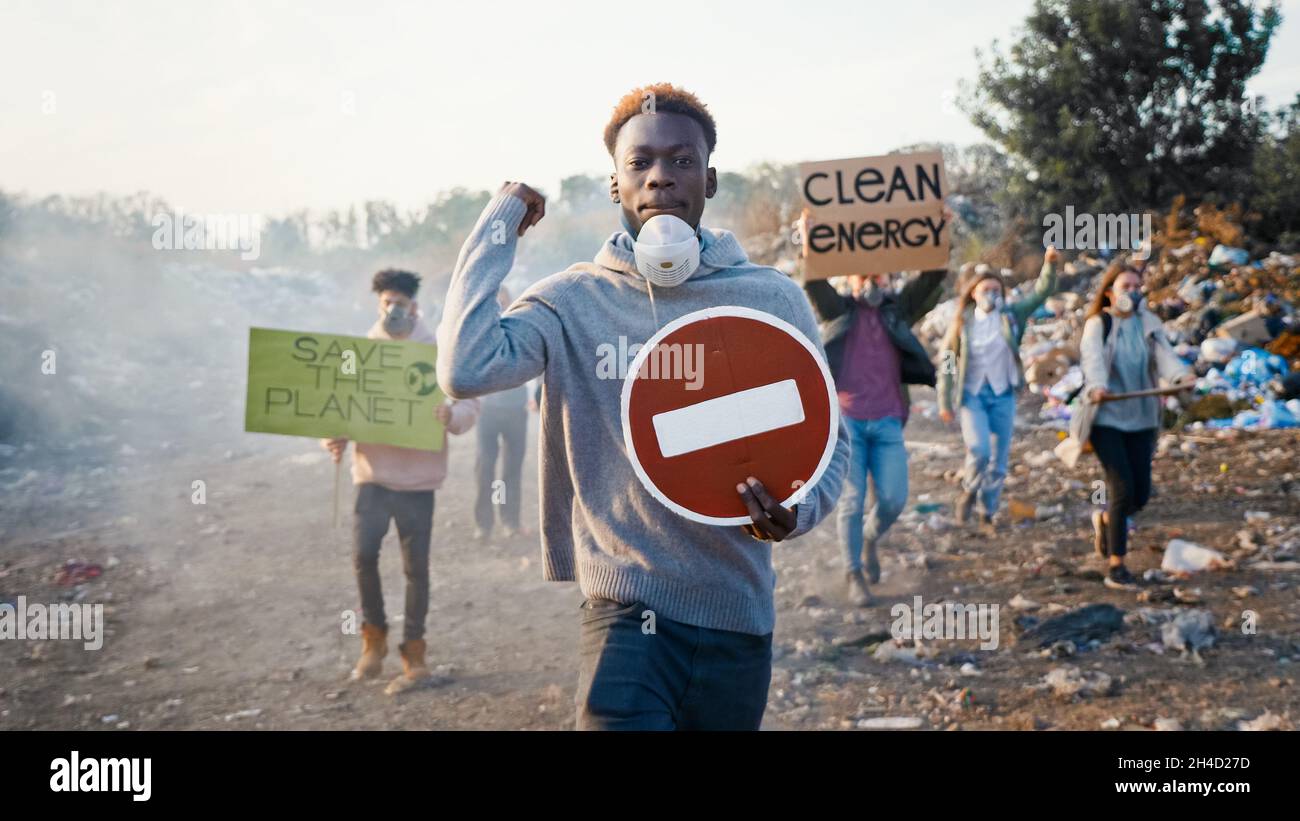 Portrait of Attractive Young Man Activist Holding Stop Sign. In the ...