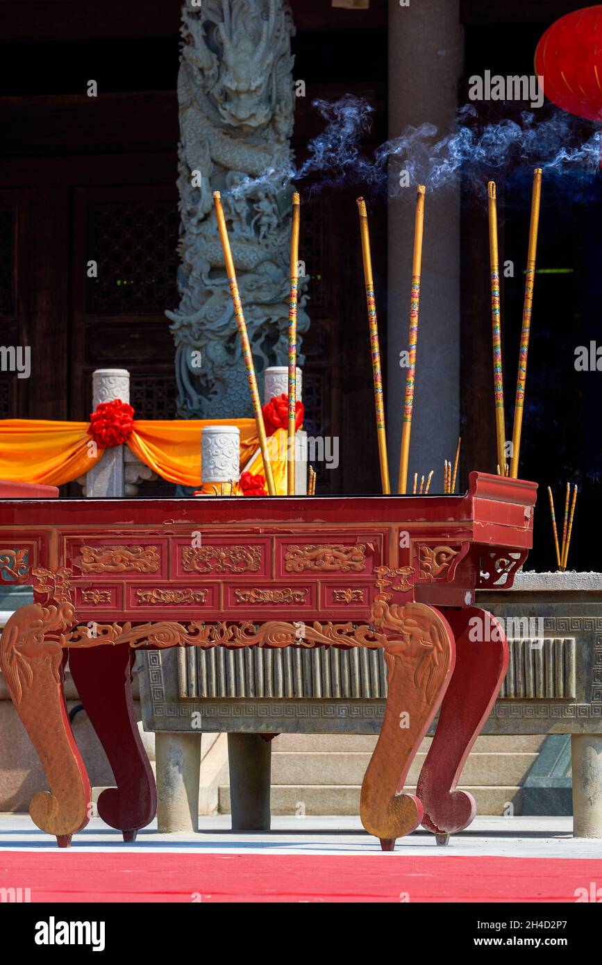 Incense burners in Chinese Buddhist temples are filled with incense ...