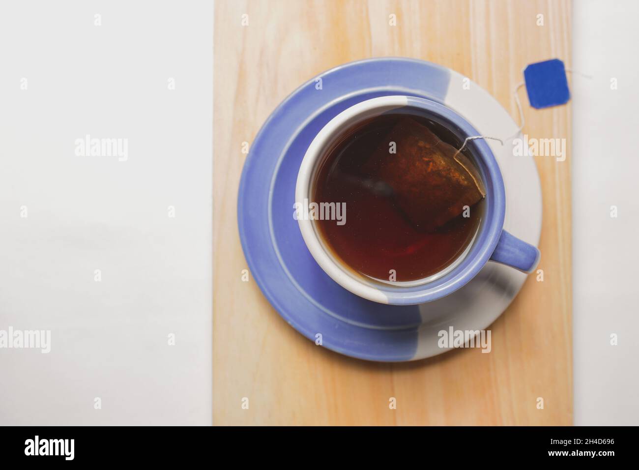 Flat lay Tea on wood on white background Stock Photo - Alamy