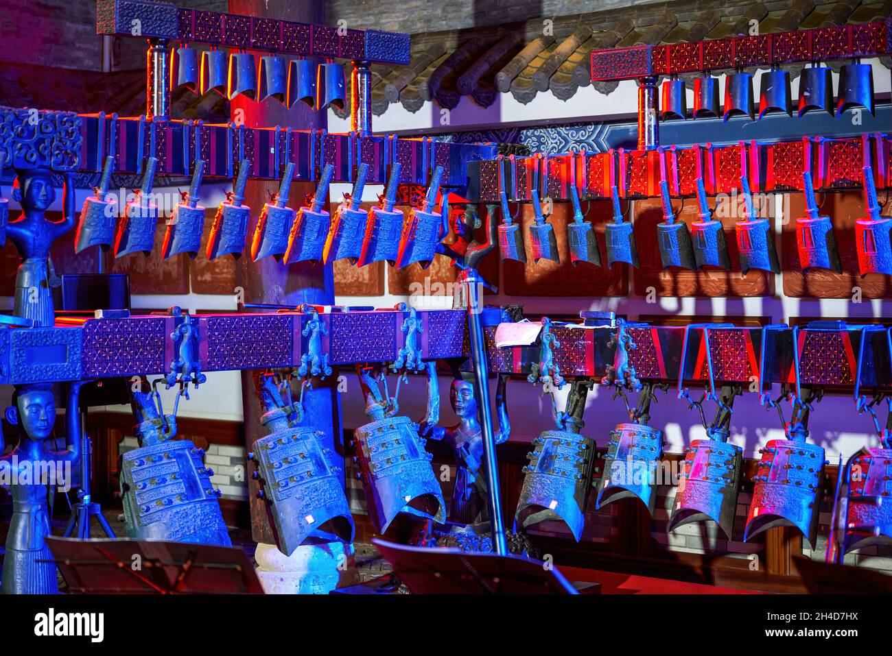A group of large traditional Chinese chimes on the stage of the concert ...