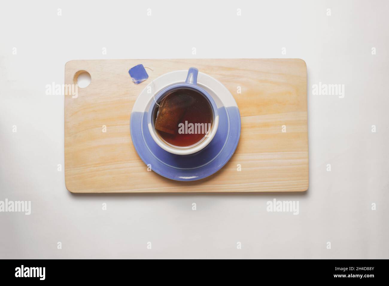 Flat lay Tea on wood on white background Stock Photo - Alamy