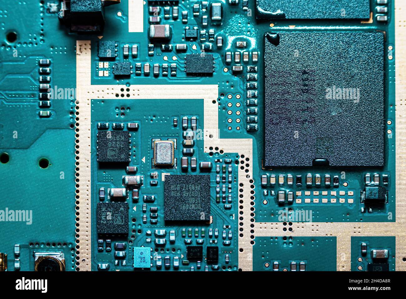 Microchips integrated on the board. The microcircuit photographed in ...