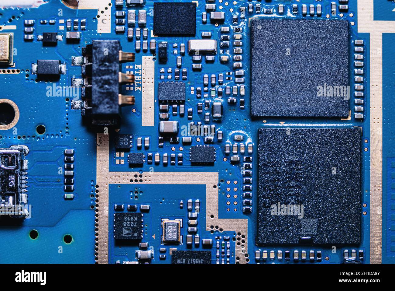 Microchips integrated on the board. The microcircuit photographed in ...