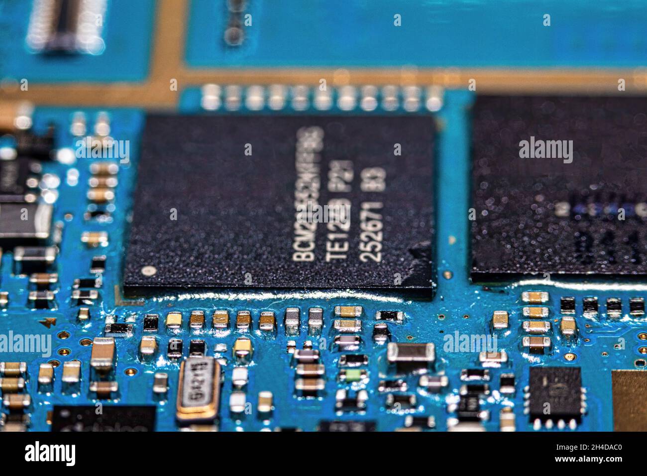 Microchips integrated on the board. The microcircuit photographed in ...