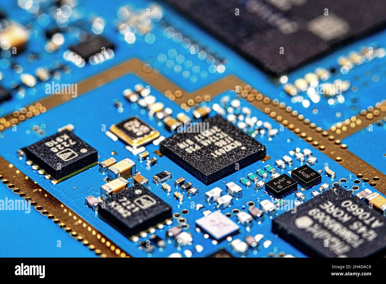 Microchips integrated on the board. The microcircuit photographed in ...