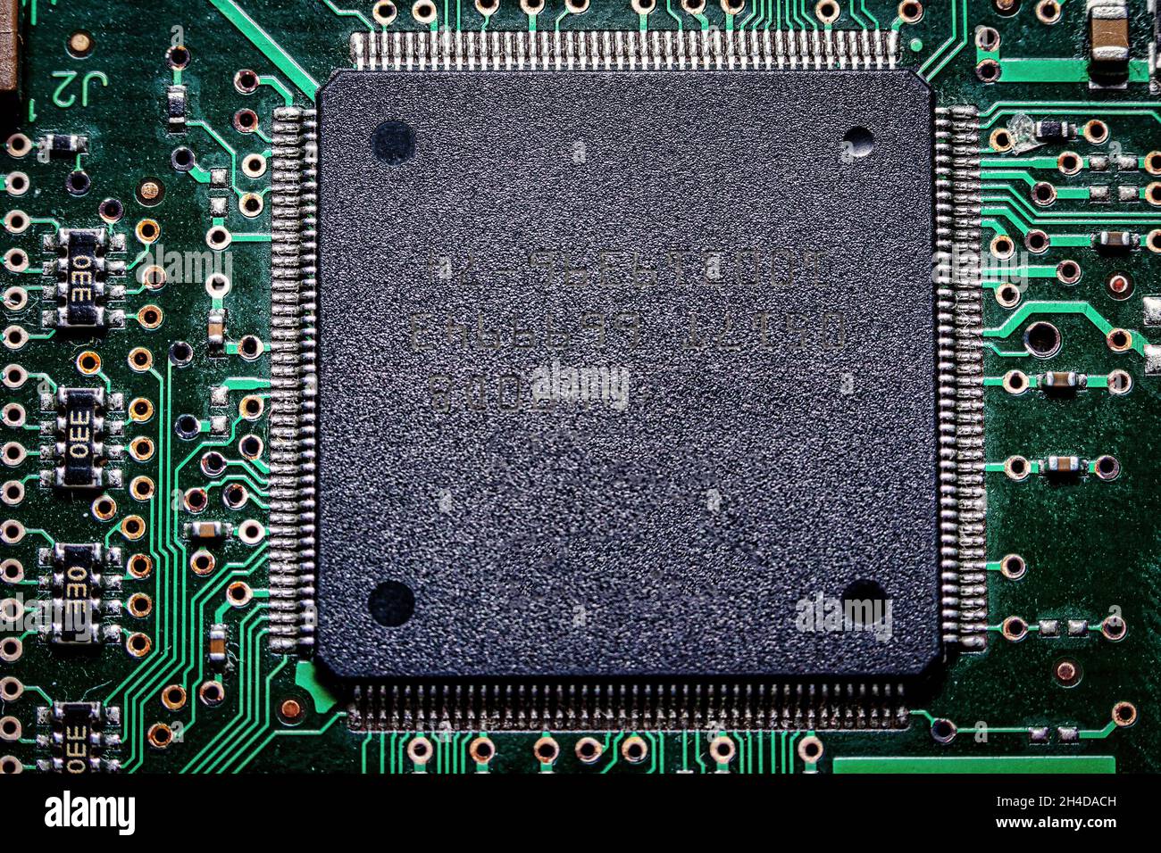 Microchips integrated on the board. The microcircuit photographed in ...