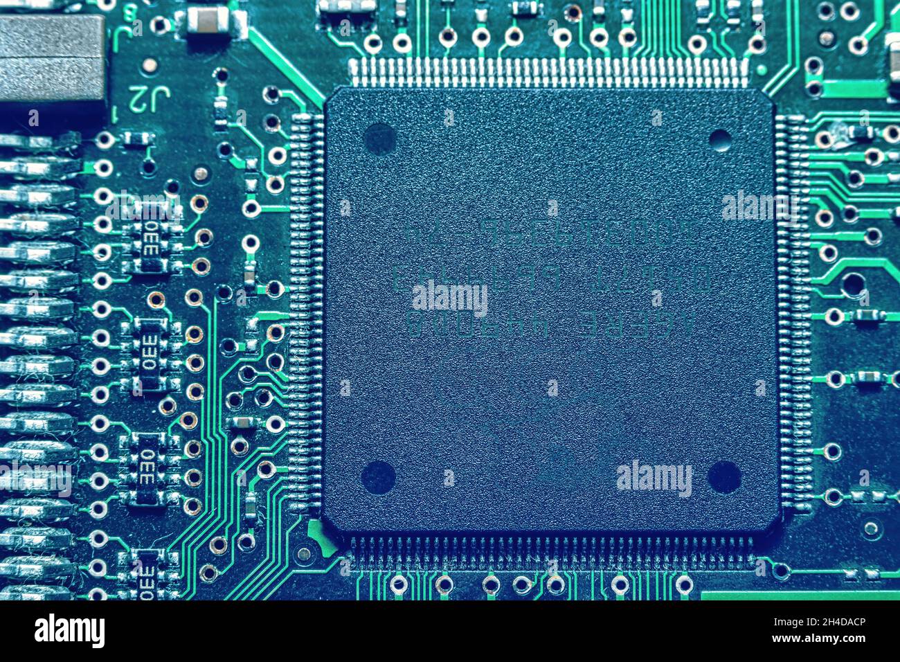 Microchips integrated on the board. The microcircuit photographed in ...