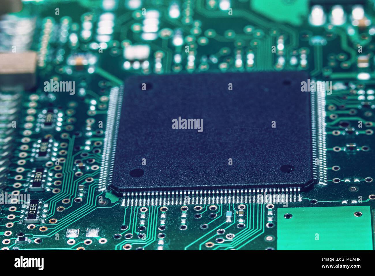 Microchips integrated on the board. The microcircuit photographed in ...