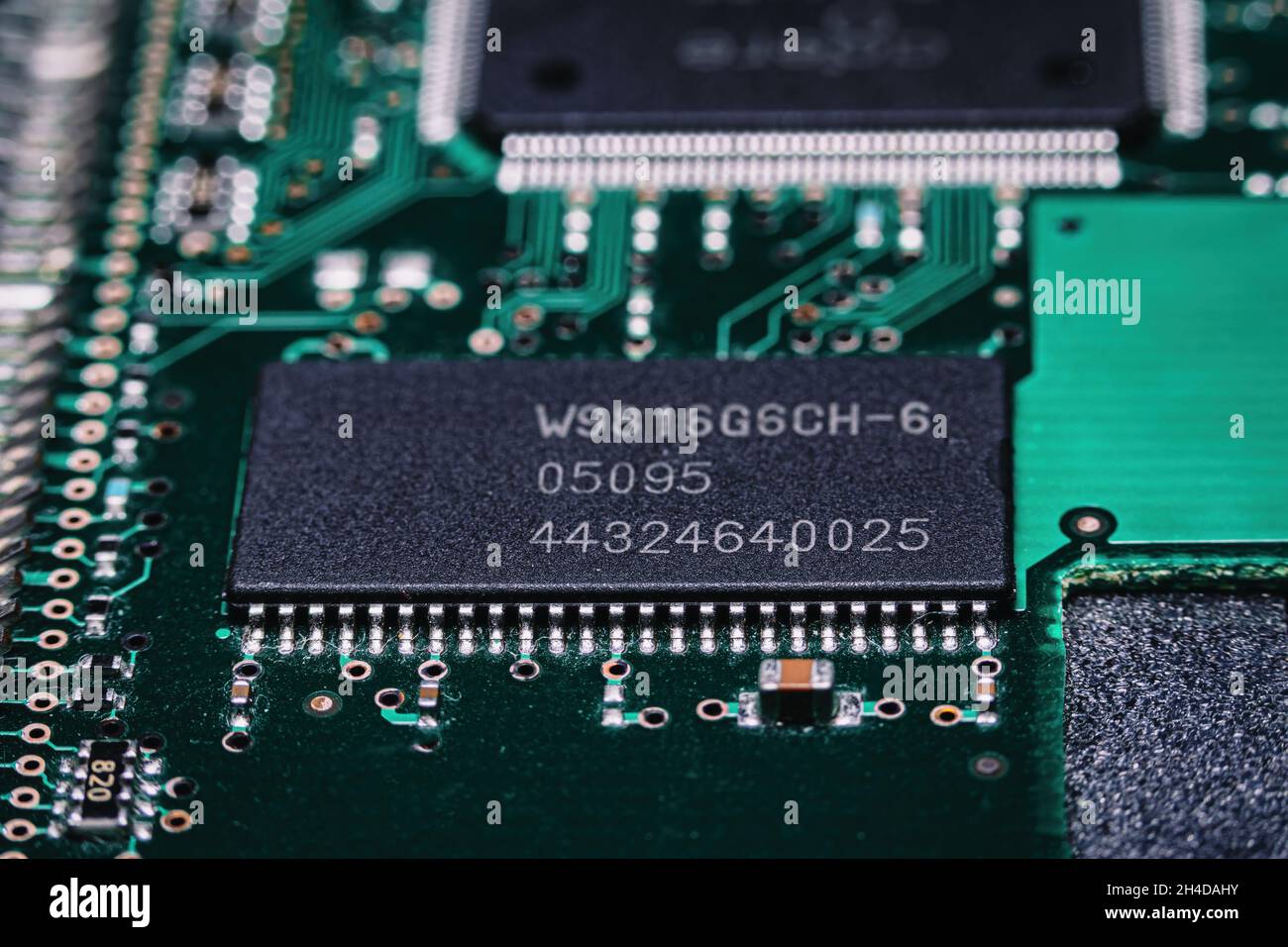 Microchips integrated on the board. The microcircuit photographed in ...