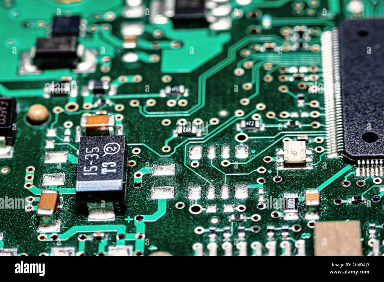 Microchips integrated on the board. The microcircuit photographed in ...